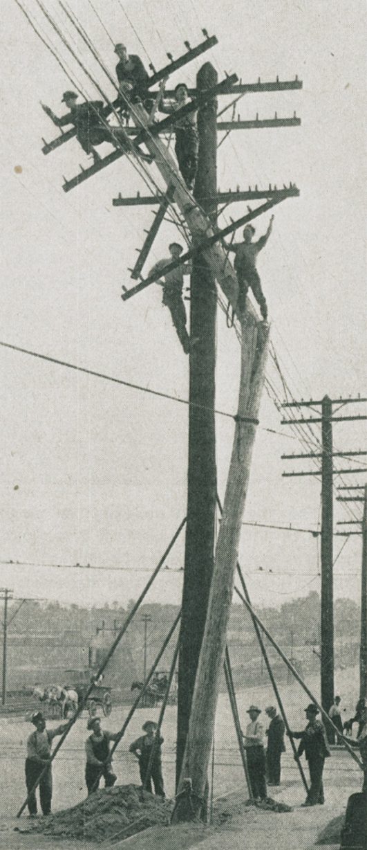 Stunning Photos of Linemen Working on Wooden Utility Poles from the ...