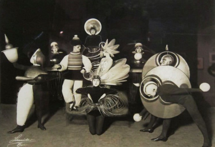 The Triadic Ballet: A Surreal Dance of Geometric Shapes in the Roaring ...